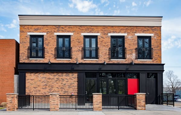 Brick building exterior - AplosGroup - Architecture